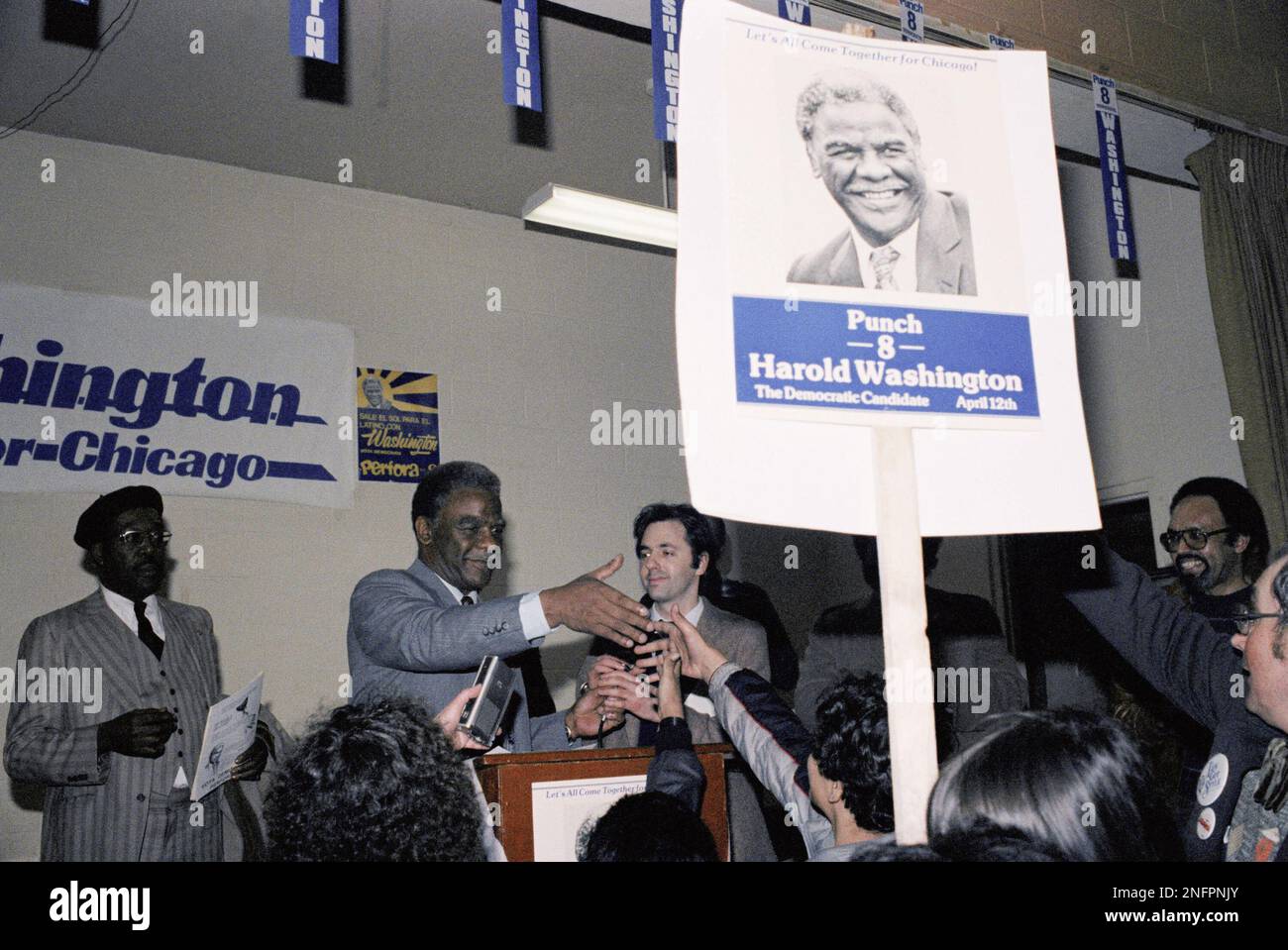 Chicago mayoral candidate Harold Washington is shown shaking hands with ... Chicago mayoral candidate Harold Washington is shown shaking hands with ...