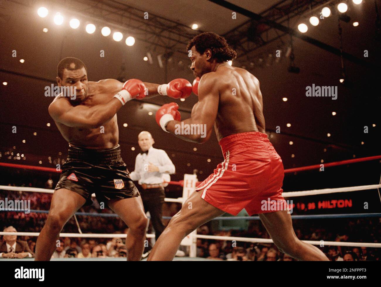 Heavyweight champions Mike Tyson, left, Tony Tucker exchange punches ... Heavyweight champions Mike Tyson, left, Tony Tucker exchange punches ...
