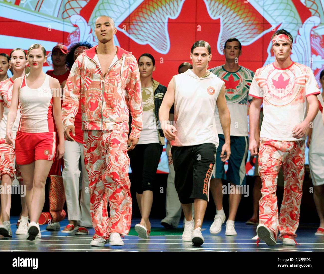 Models and Olympic athletes model Canadian Olympic replica wear, which ...