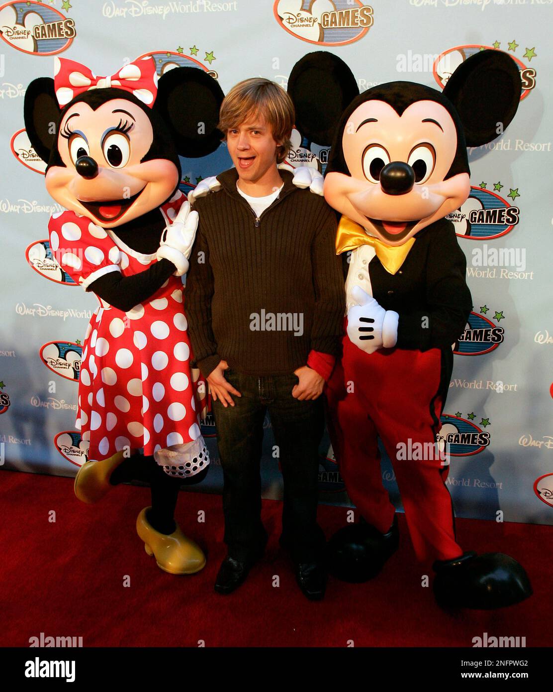 Jason Earles from Disney Channel's "Hannah Montana" poses with Minnie ...