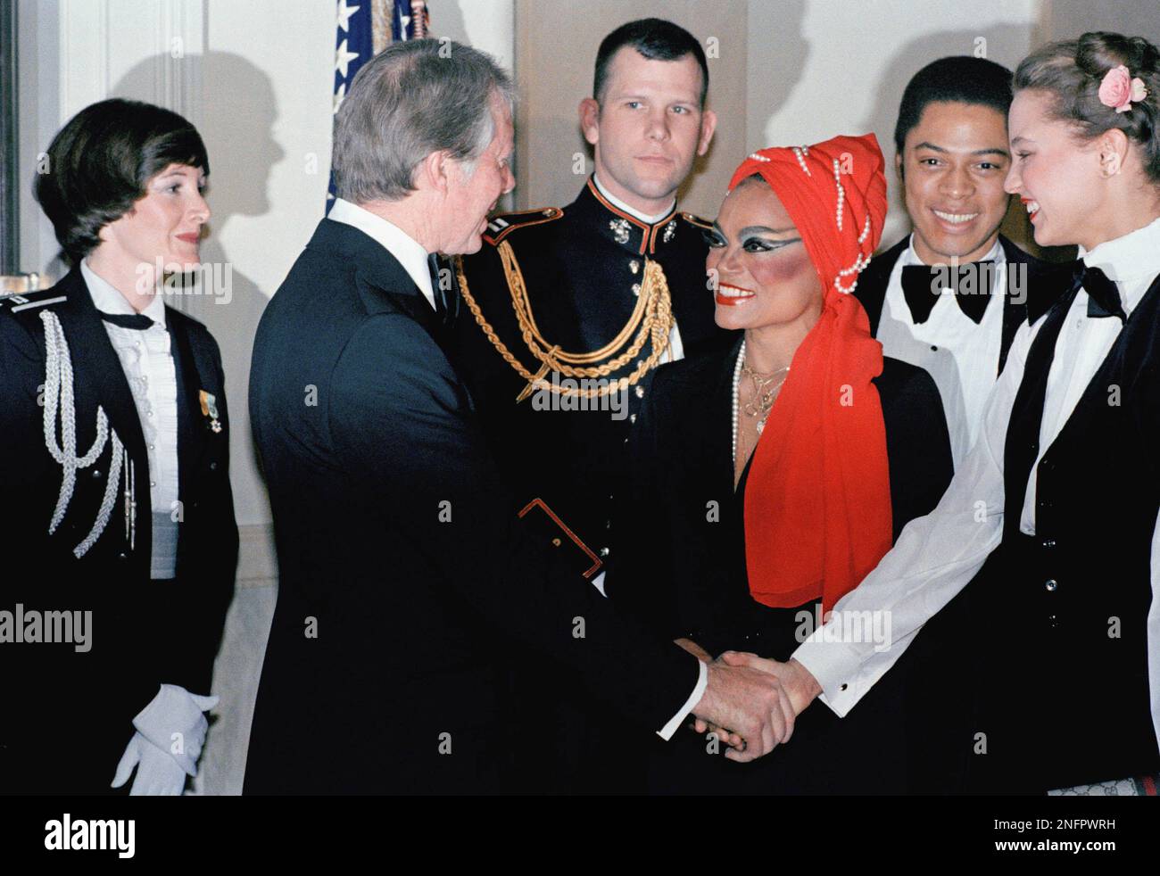Eartha Kitt and her daughter Kitt McDonald, far right, are greeted by President Jimmy Carter at ...