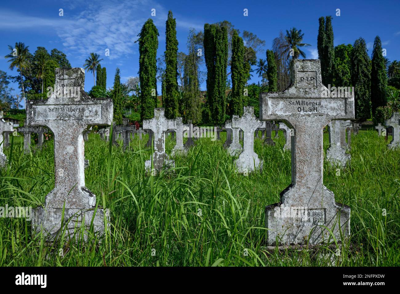 Graves on the cemetery of the Catholic mission of Vunapope, Kokopo ...
