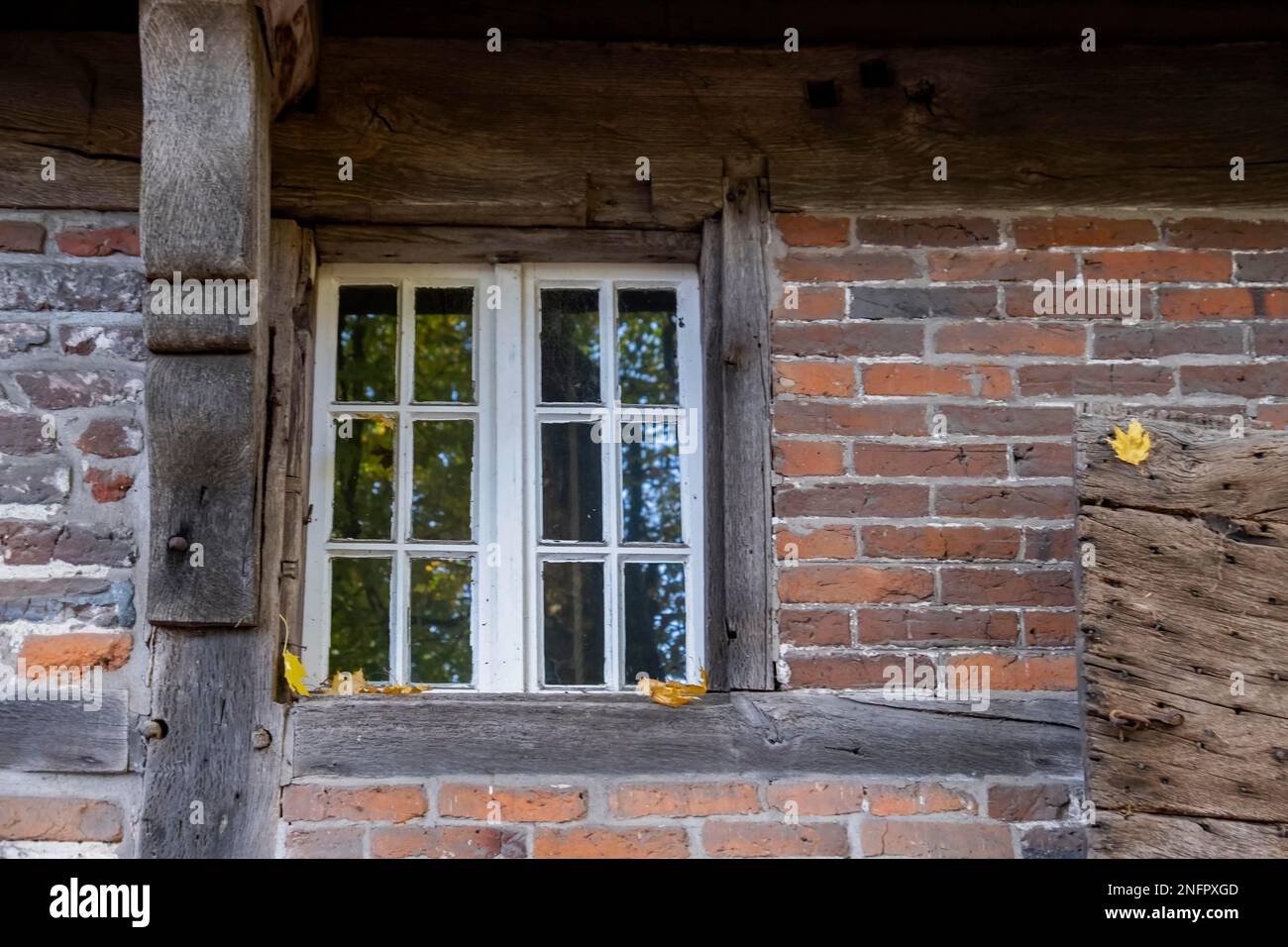 Windows of a historic water mill Stock Photo - Alamy