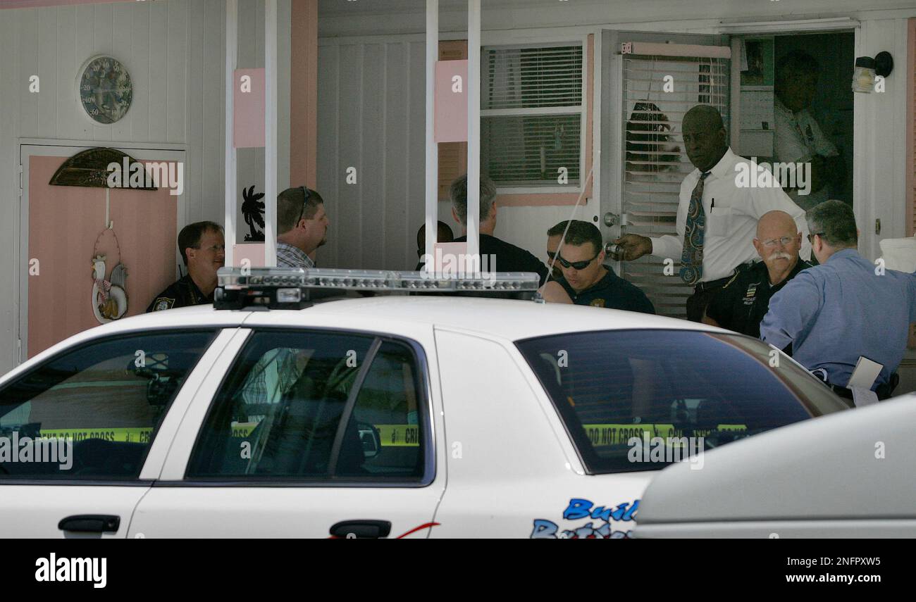 Tarpon Spring, Fla., police officers and Pasco County Sheriff's ...
