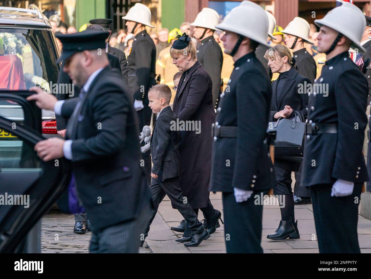 Shelley, widow of Barry Martin with their eight-year-old twins Oliver ...