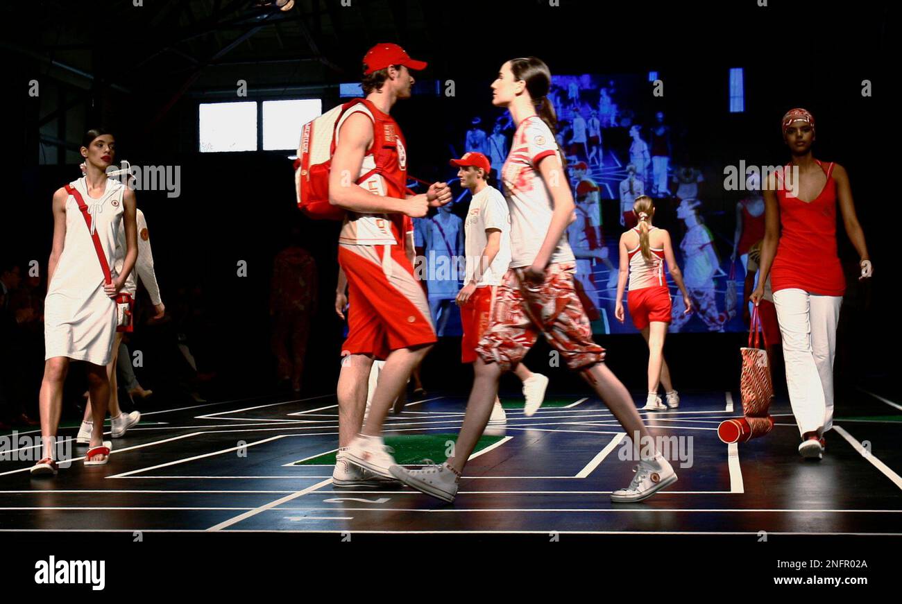 Models and Olympic athletes model the clothing which will be worn by ...