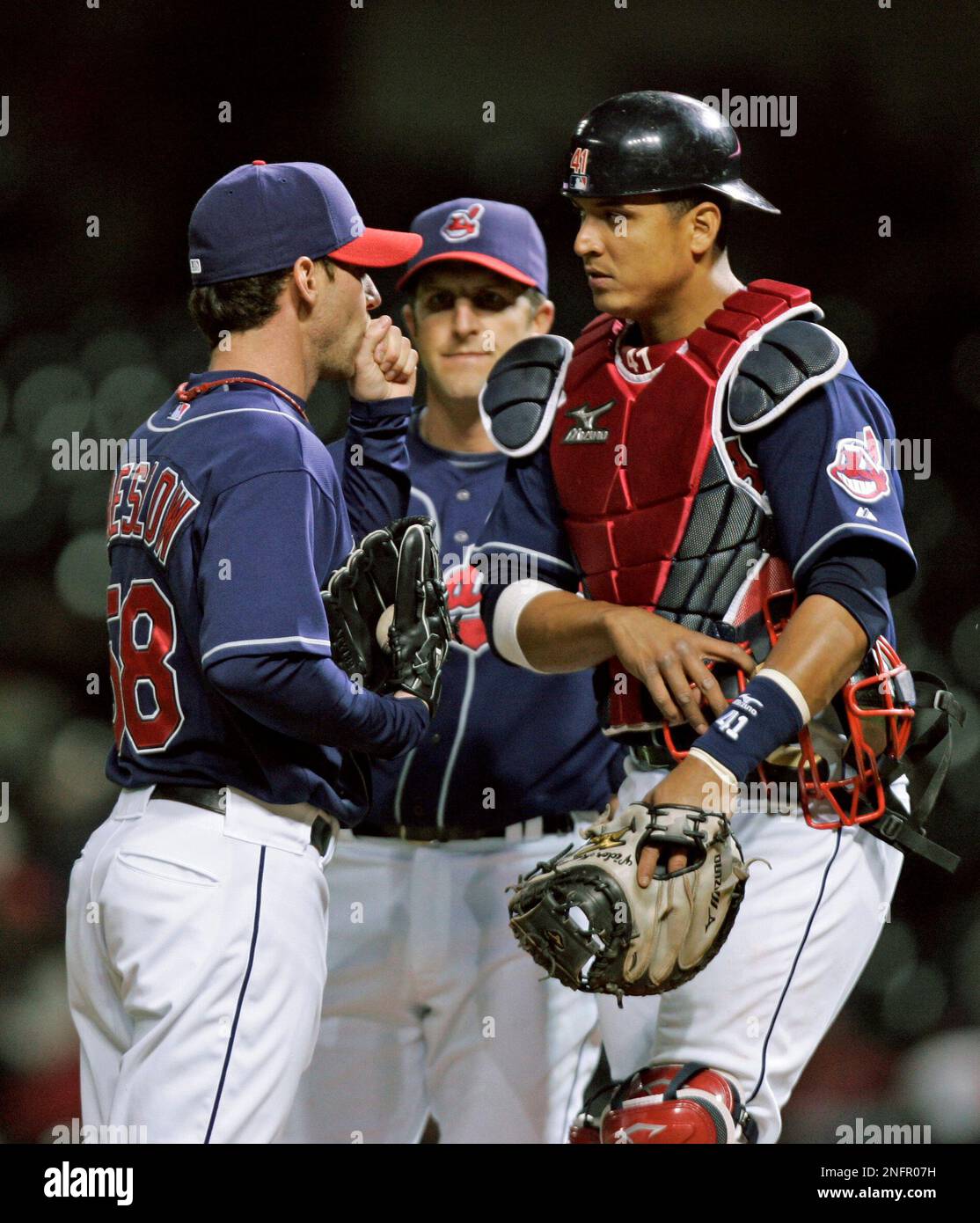 Cleveland Indians catcher Victor Martinez, right, talks with relief ...