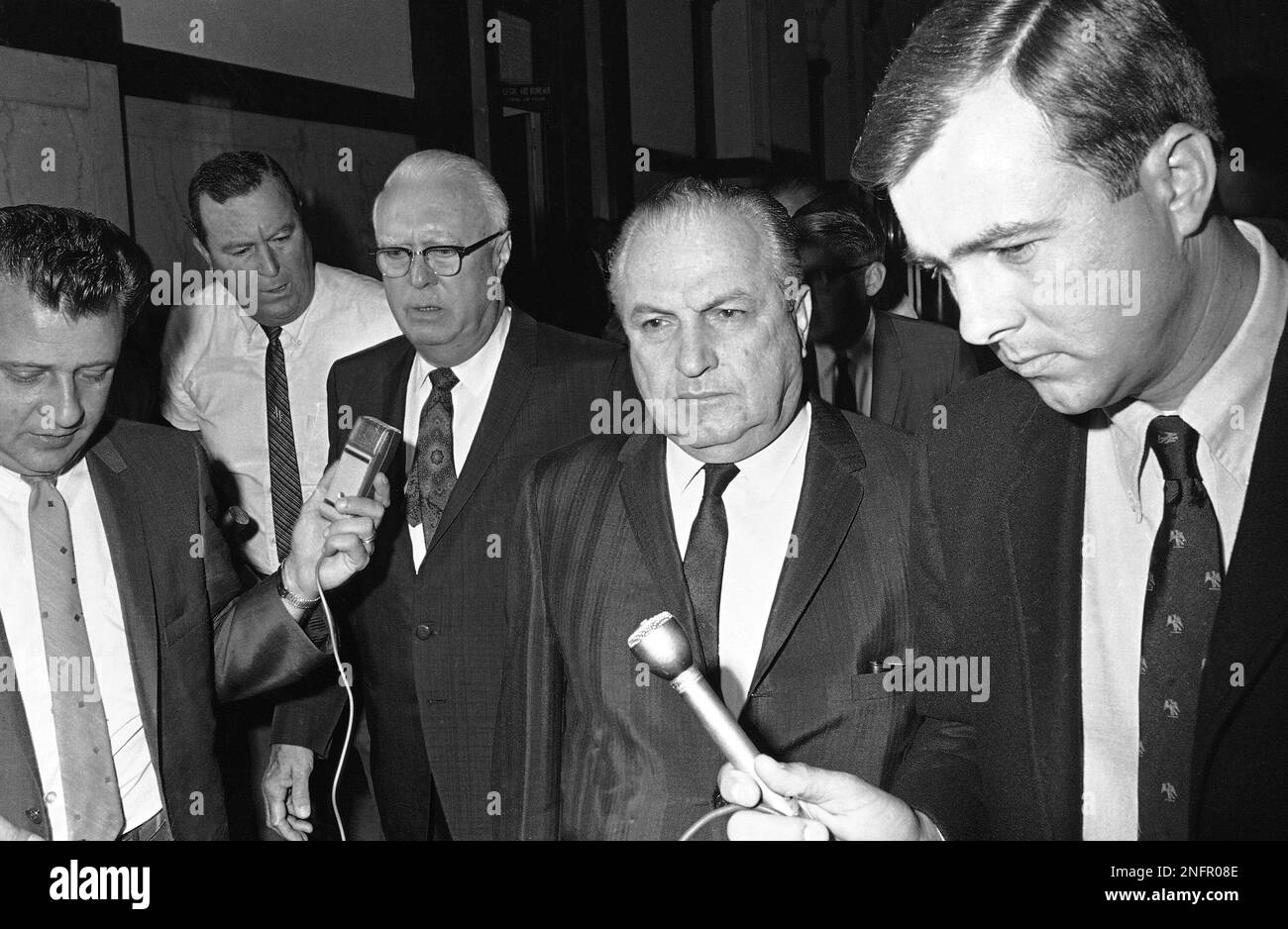 New Orleans rackets figure Carlos Marcello, center, appeared before the ...