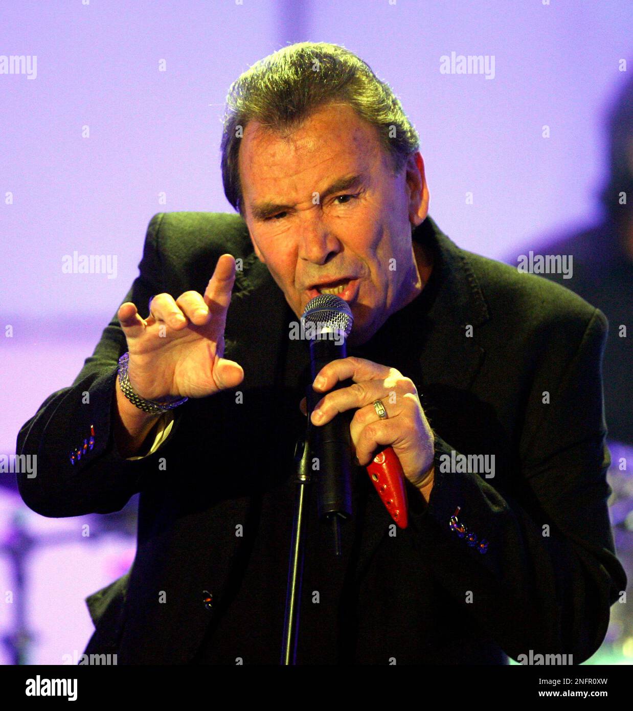 Reg Presley, frontman of British rock group The Troggs, performs in a ...