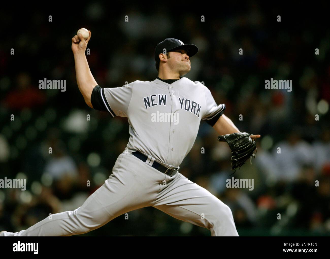 New York Yankees' Joba Chamberlain pitches against the Cleveland ...