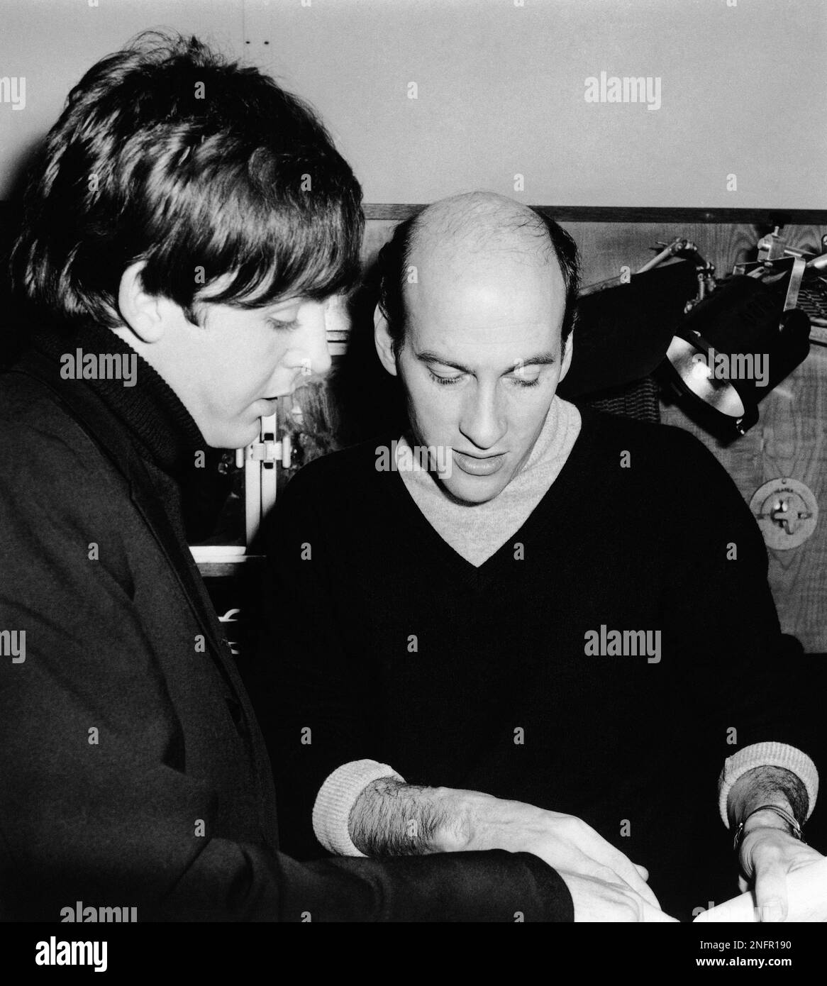 Director Richard "Dick" Lester goes over some script changes with ...