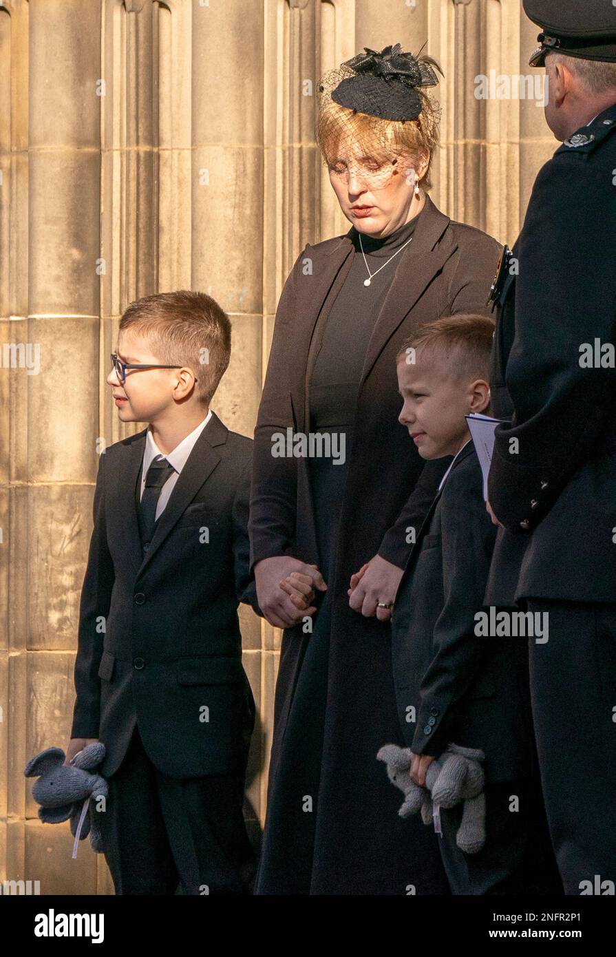 Shelley, widow of Barry Martin with their eight-year-old twins Oliver ...