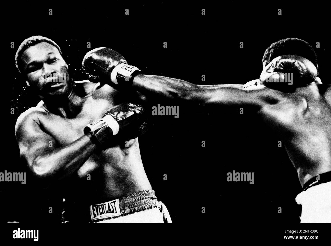 Former world boxing heavyweight Larry Holmes delivers a blow to the ...
