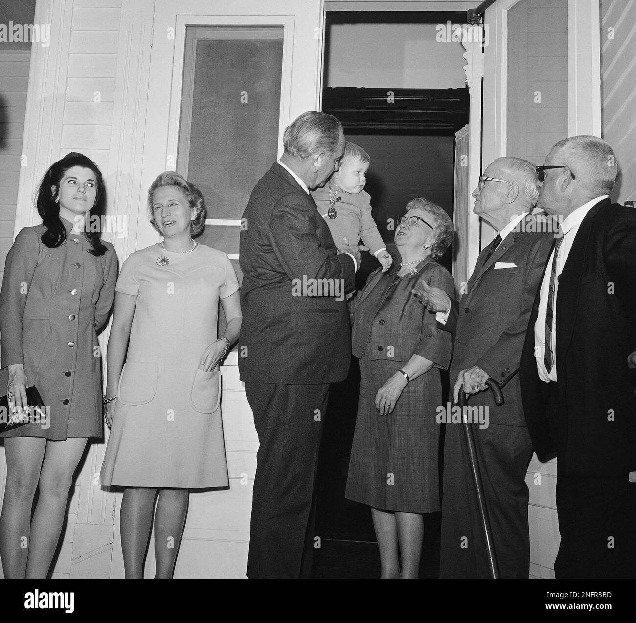 President Lyndon Johnson, center, holds his grandson, Lyn Nugent, 1 1/2 ...