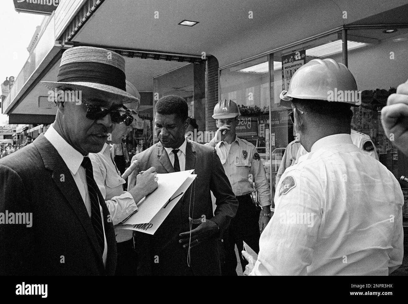 Roy Wilkins, left, executive secretary of the NAACP, and Medgar Evers ...