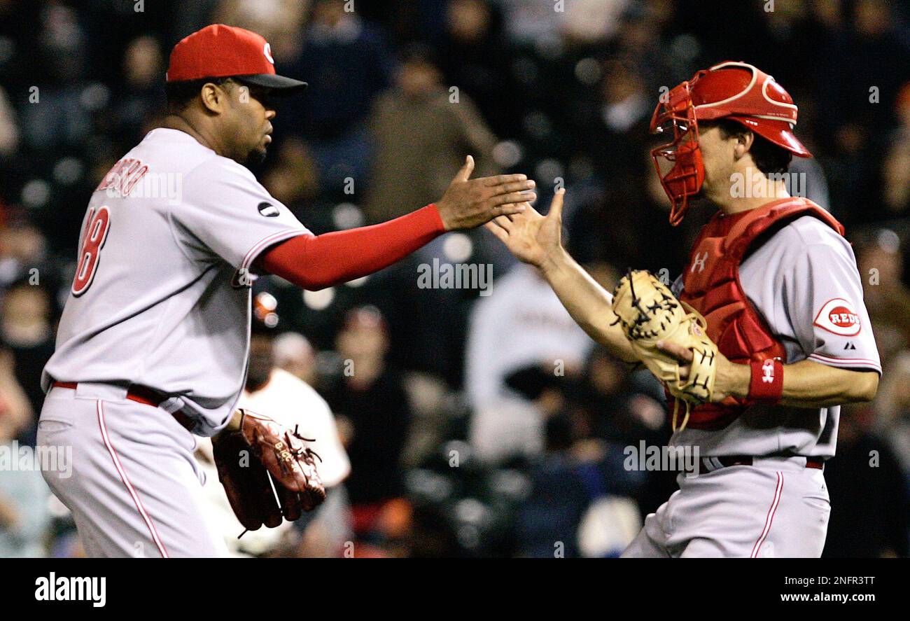 Cincinnati Reds' Francisco Cordero, left, is congratulated at the end ...