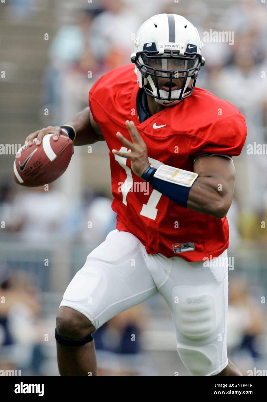 Penn State quarterback Daryll Clark scrambles during the first half of ...