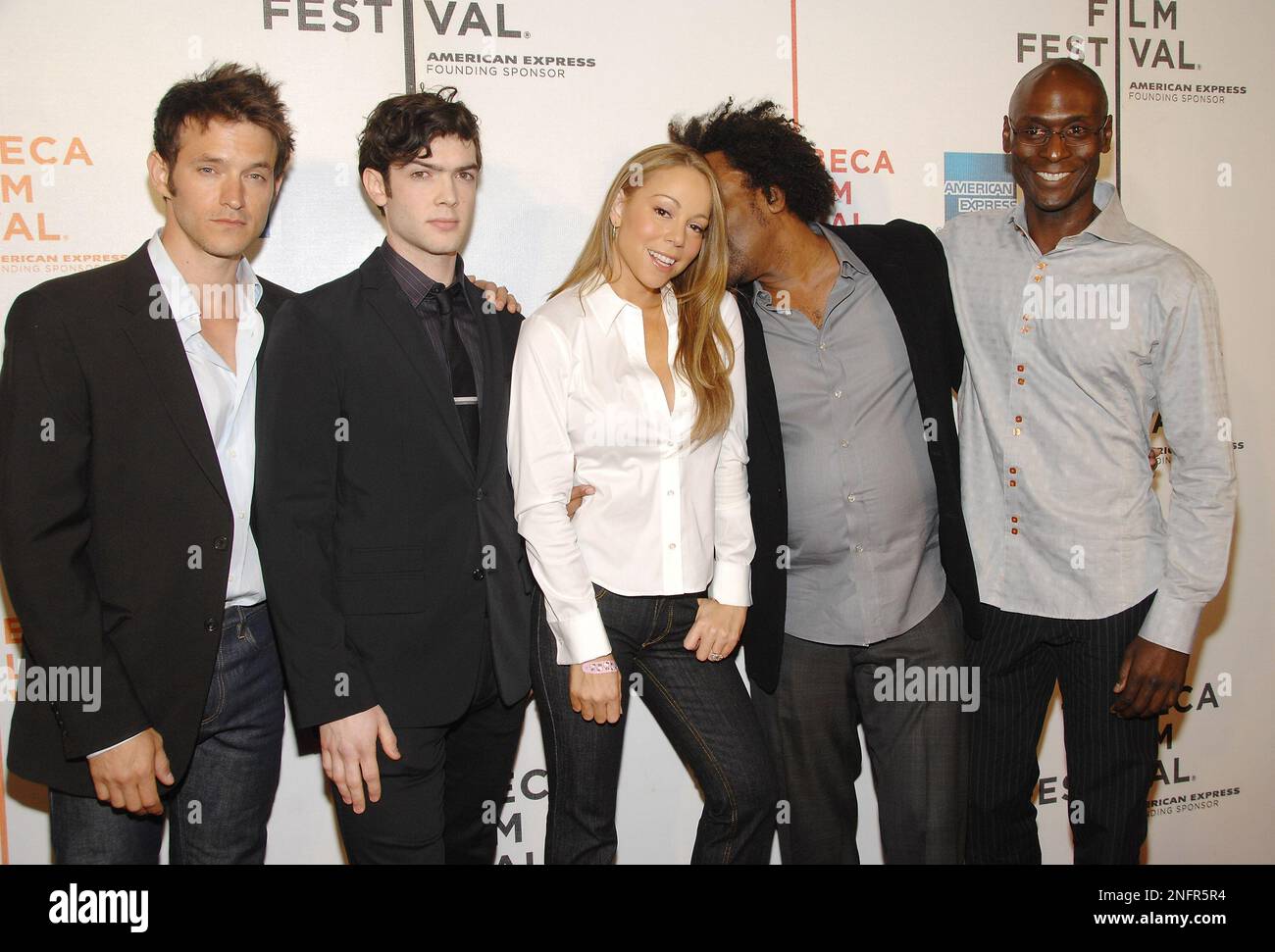 From left, actor Adam Rothberg, actor Ethan Peck, actress Mariah Carey ...