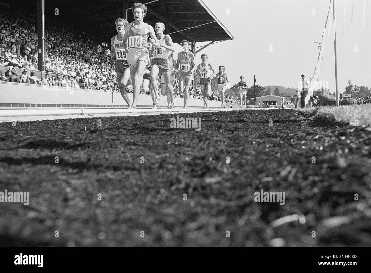 Oregon's Steve Prefontaine (229), the American record holder, begins to ...