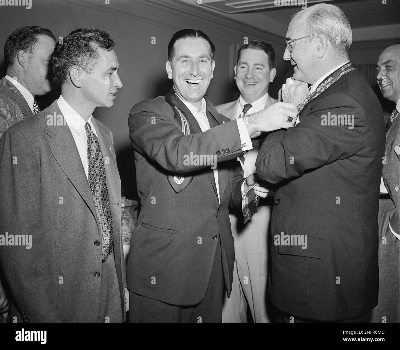 General Electric Vice President Lemuel R. Boulware (right), in a jovial ...