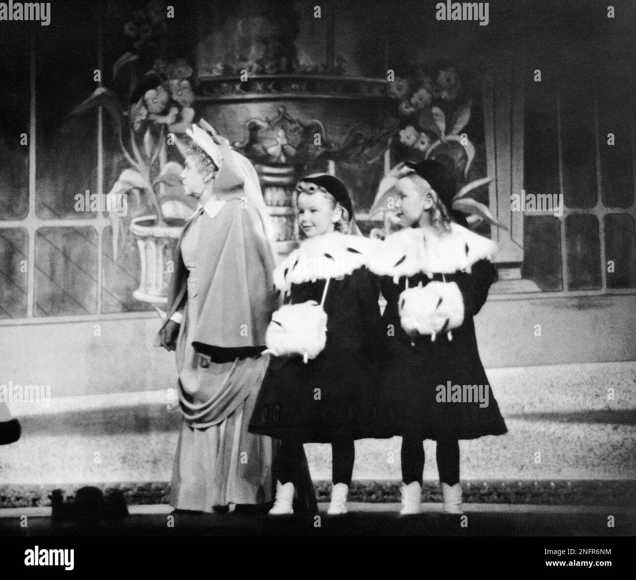 The Lally twins, Joan and Janet, shown Jan. 20, 1945, make a charming ...