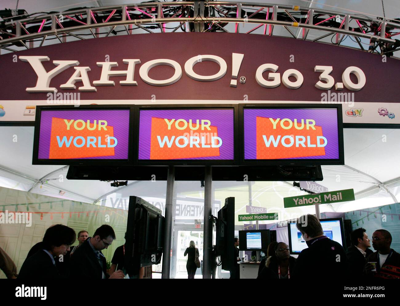 Inside the Yahoo booth at the Consumer Electronics Show in Las Vegas, Jan. 9, 2008. (AP Photo ...