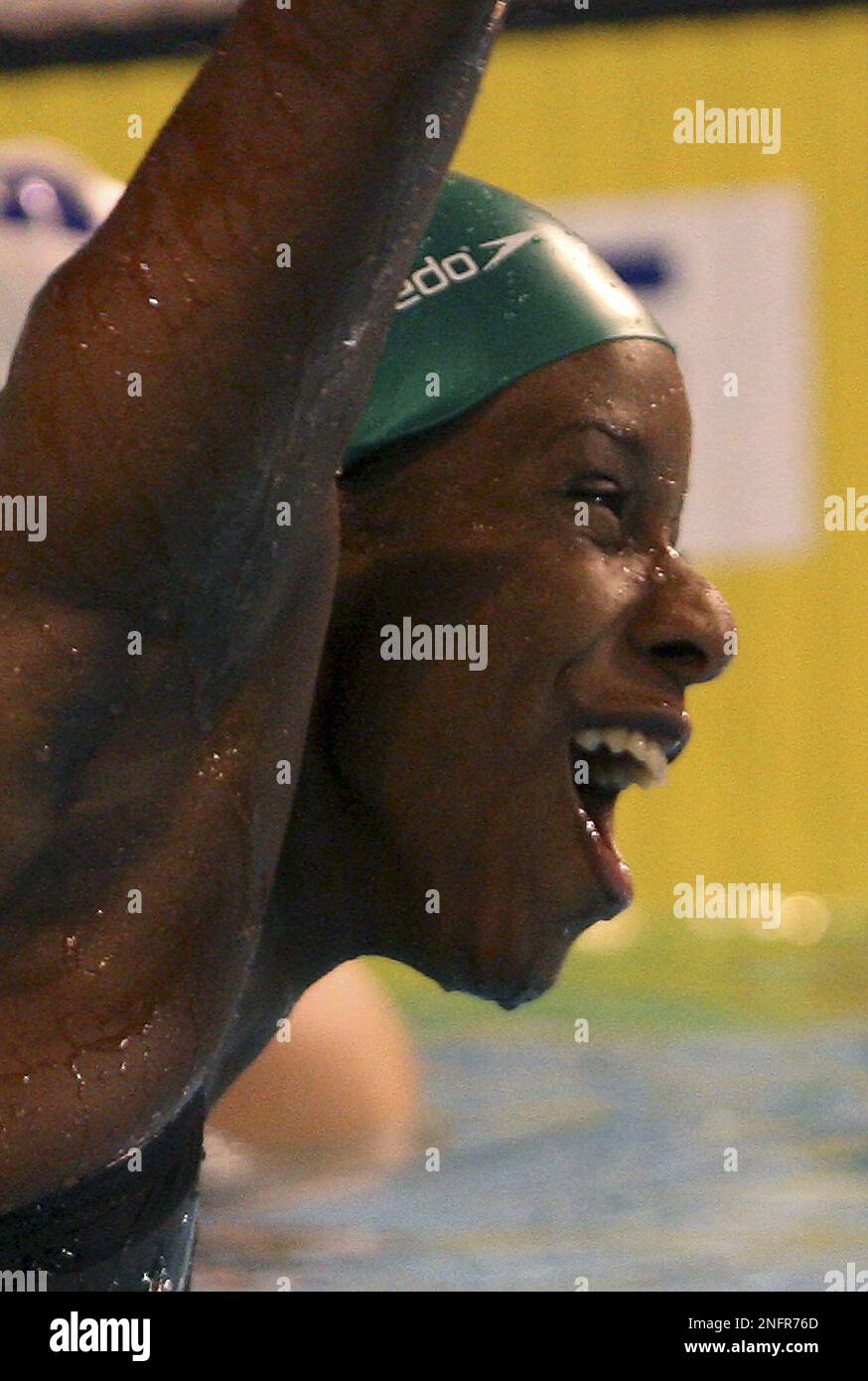 French swimmer Malia Metella reacts after winning the 100 meter ...