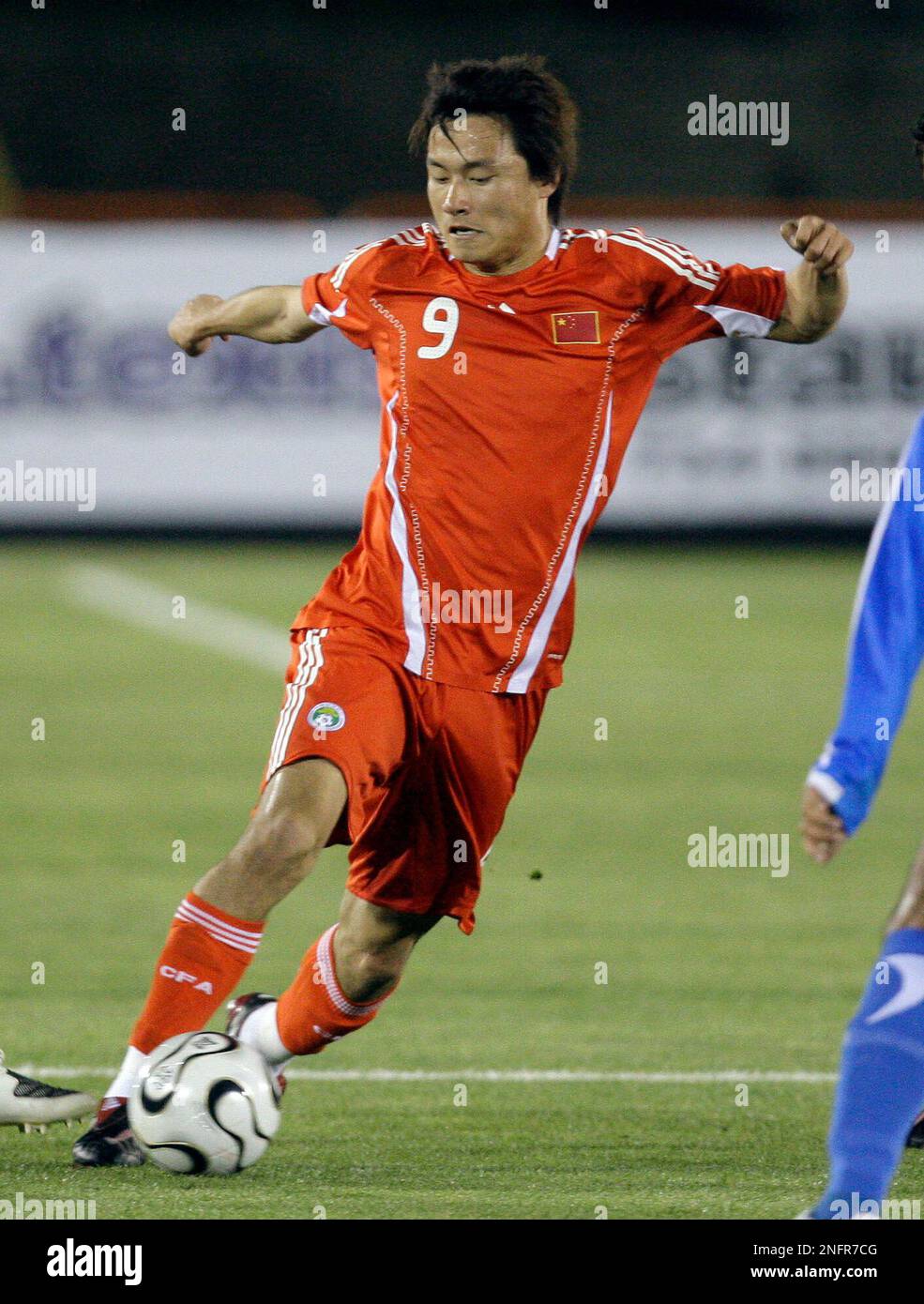 China's Lin Gao competes against El Salvador during a friendly soccer ...
