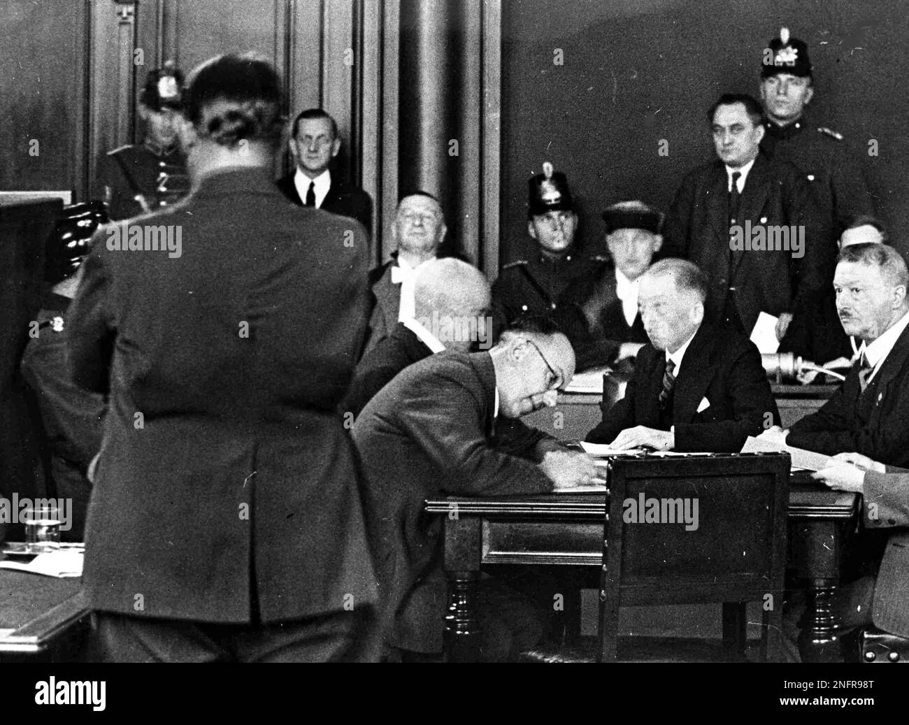 German Interior Minister General Hermann Goering, back to camera, in ...