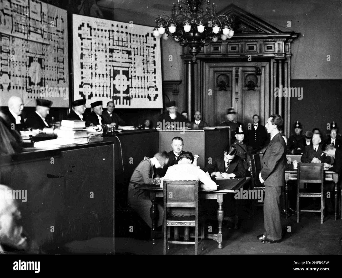 Minister of Propoganda Dr. Joseph Goebbels, standing right, gives ...