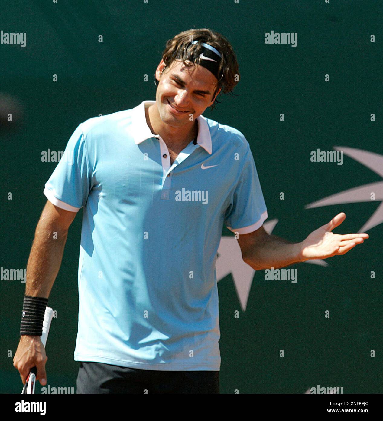 Swiss player Roger Federer reacts during his third round match of the ...