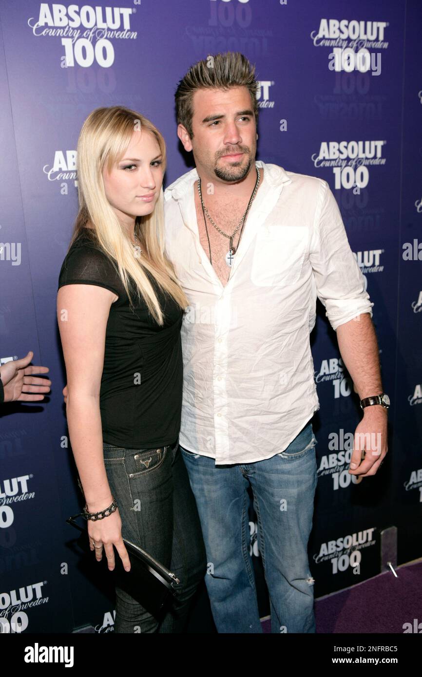 Jason Wahler, right, and Katja Decker-Sadowski arrive at the after ...