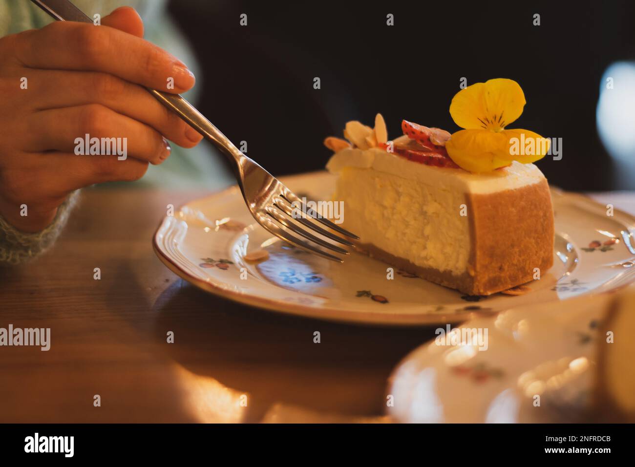 Girl eating cheese cake in hi-res stock photography and images - Alamy