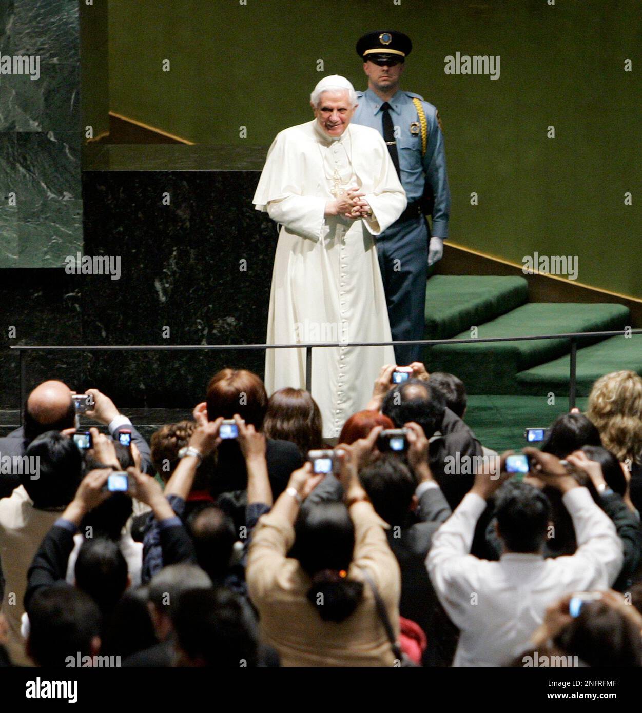 Pope Benedict XVI is the object of cameras of the U.N. staff after he ...