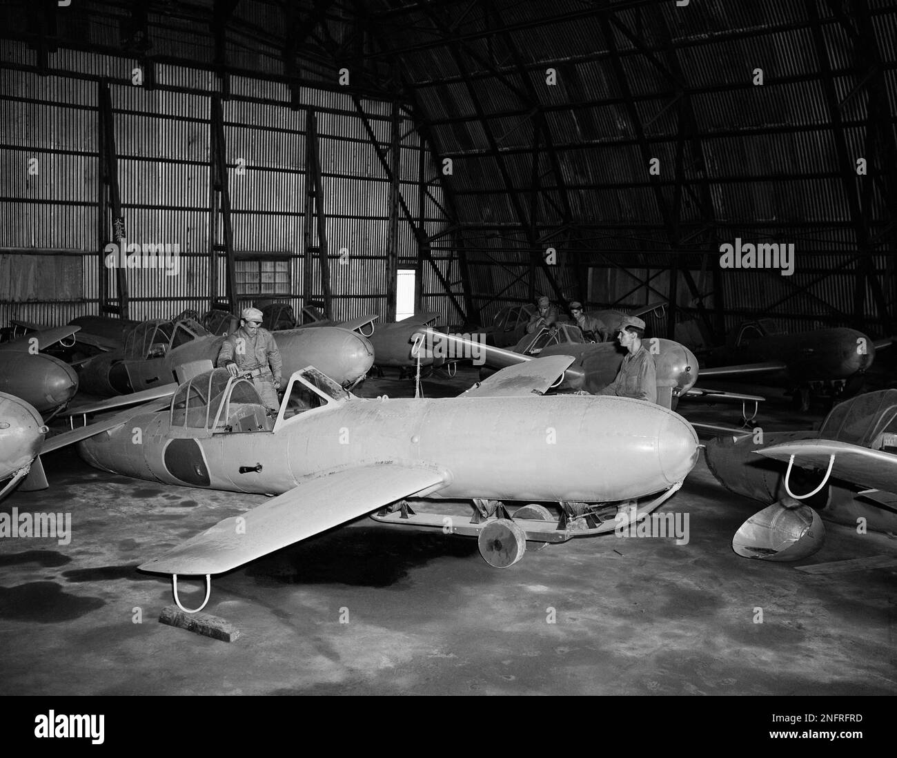 U.S. Marines of 1st regiment of Fourth Marine Division look over ...