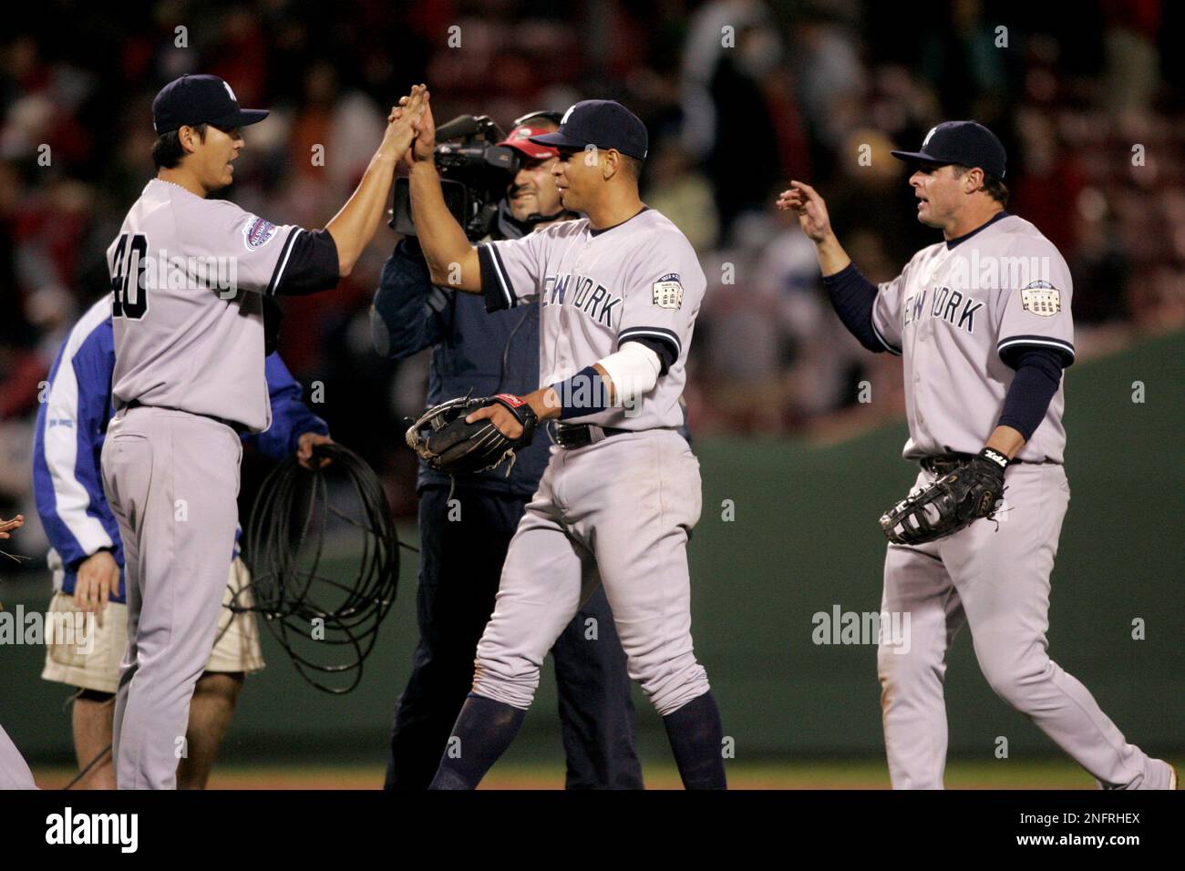 New York Yankees' Alex Rodgriquez, center, and Jason Giambi, left ...