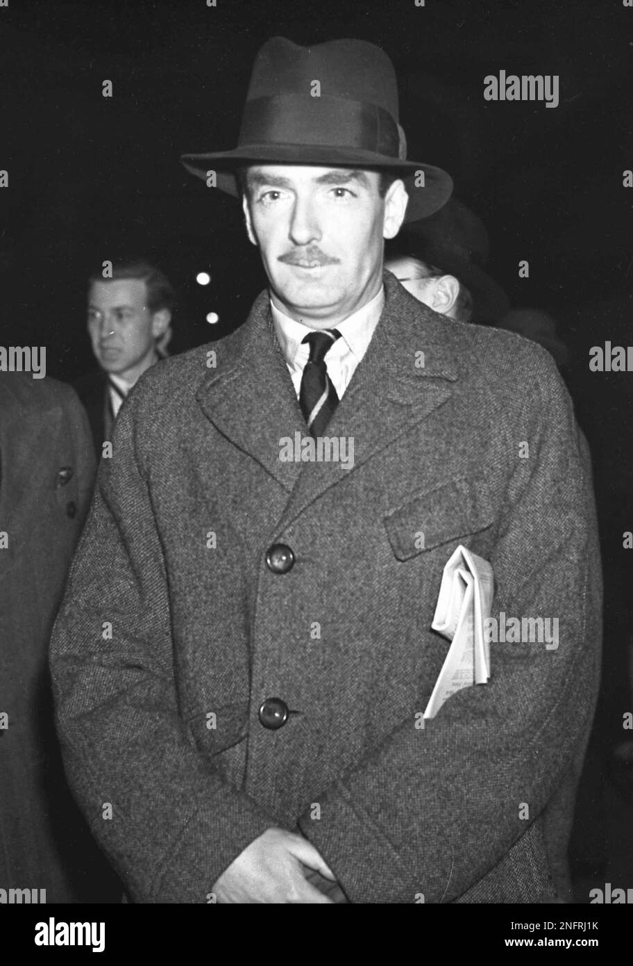 Foreign Secretary Anthony Eden arrives at Victoria Station, London, Jan ...