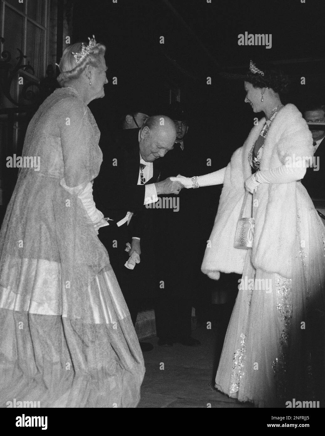 Prime Minister Sir Winston Churchill bends to kiss the hand of his ...