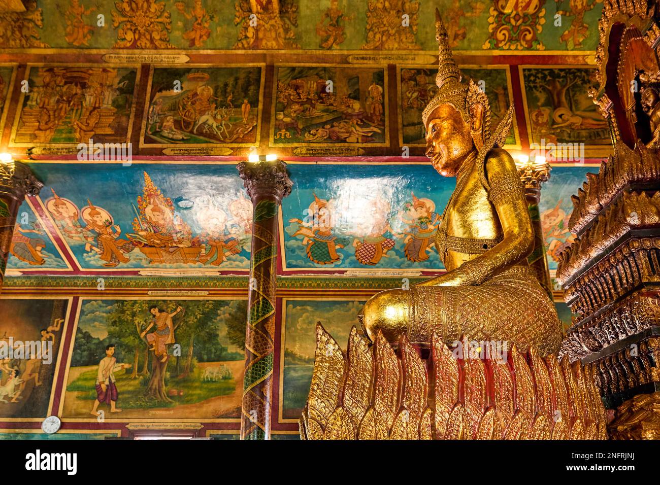 The golden interiors of the Wat Phnom Temple in Phnom Penh, Cambodia ...
