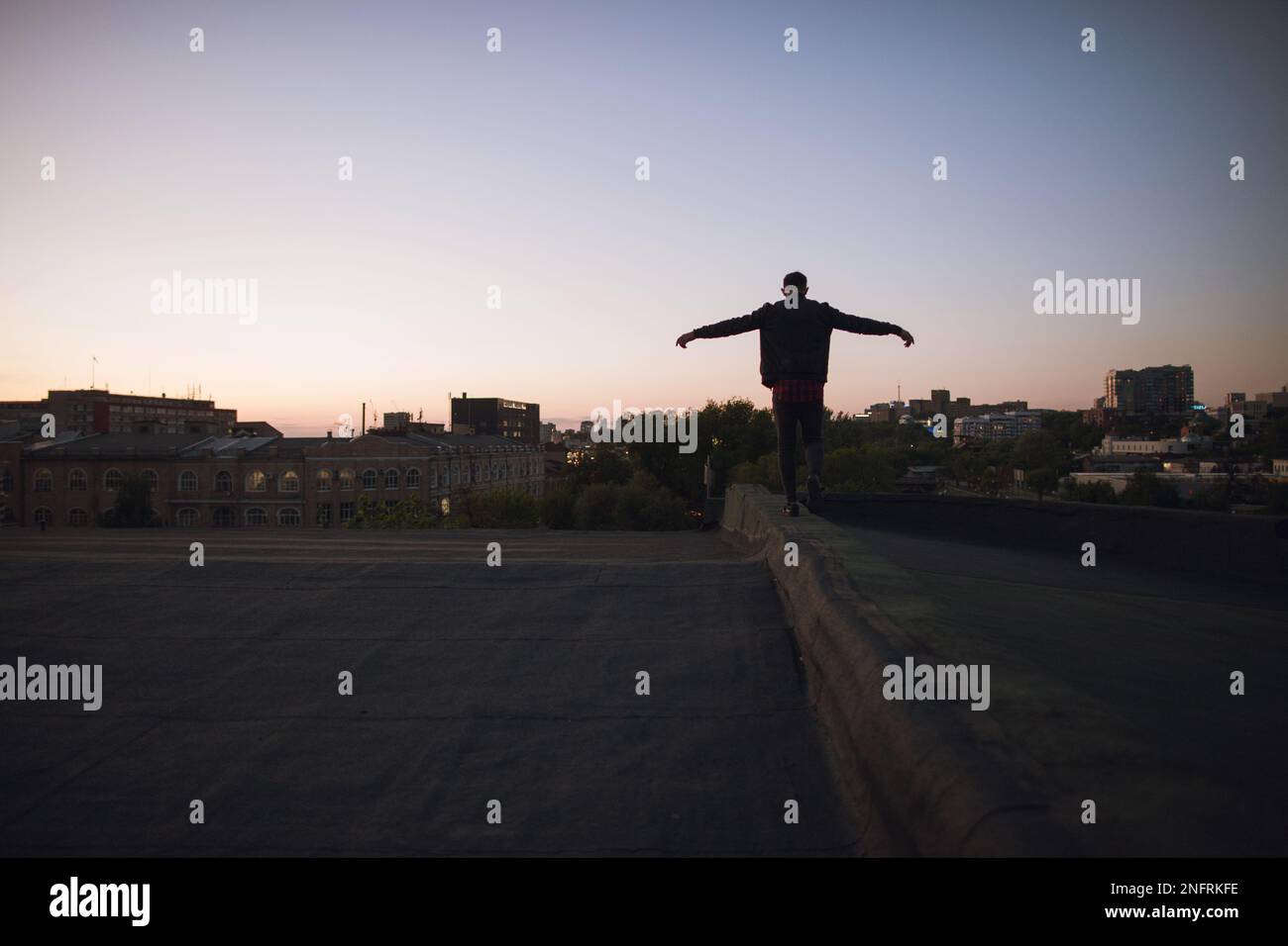 Back view unrecognizable man walks hi-res stock photography and images ...