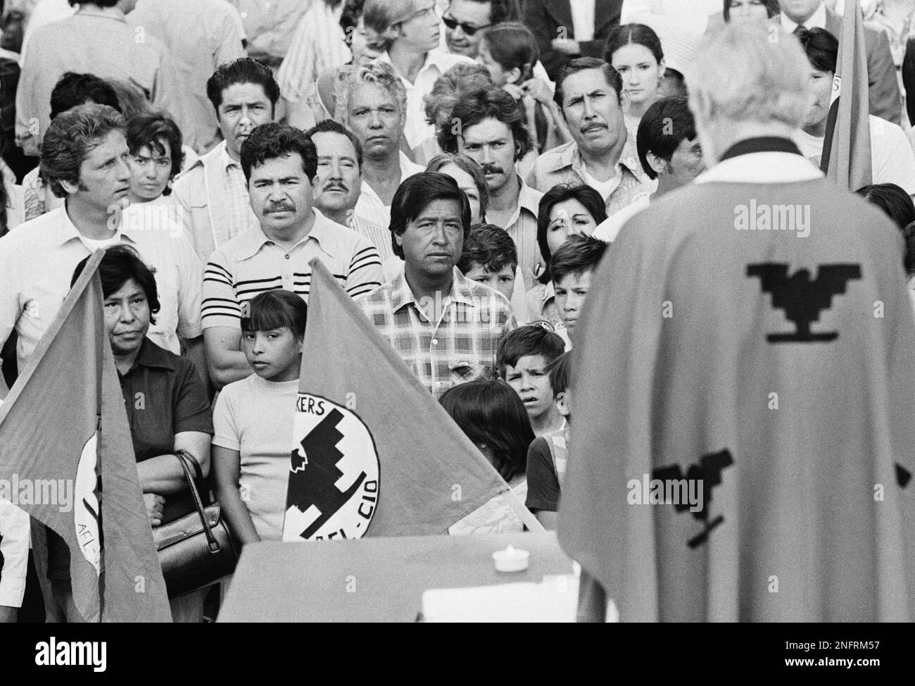 Cesar Chavez, center, and followers attend an outdoor Mass on the ...