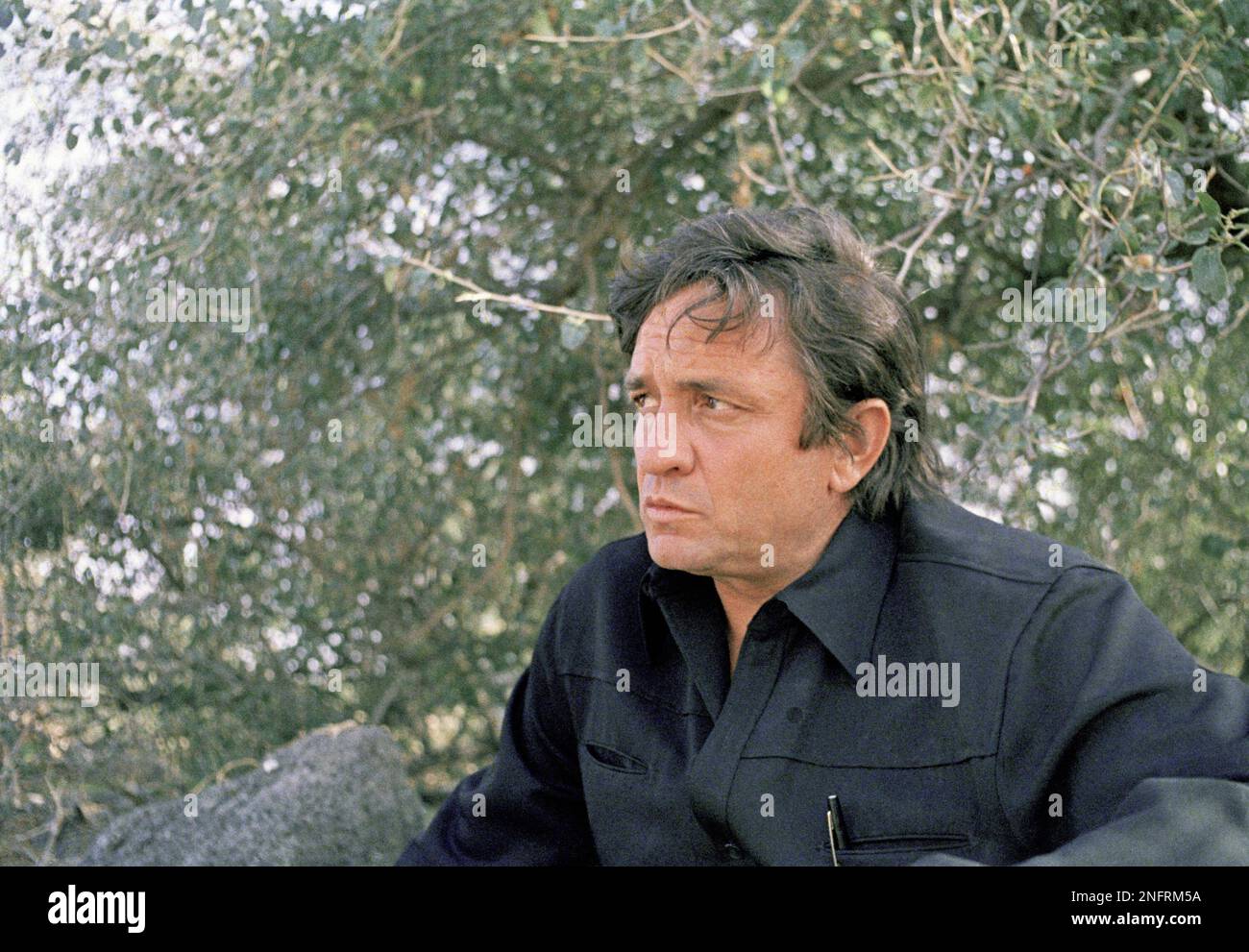 American country singer Johnny Cash shown on location during the ...