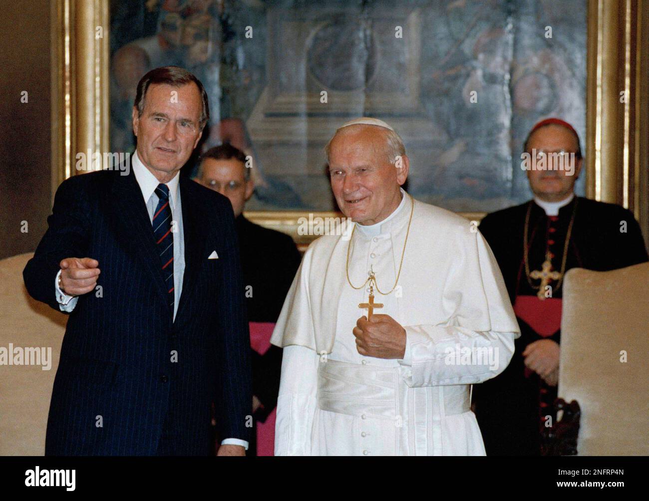 ** FILE ** President George H.W. Bush, stands with Pope John Paul II in ...