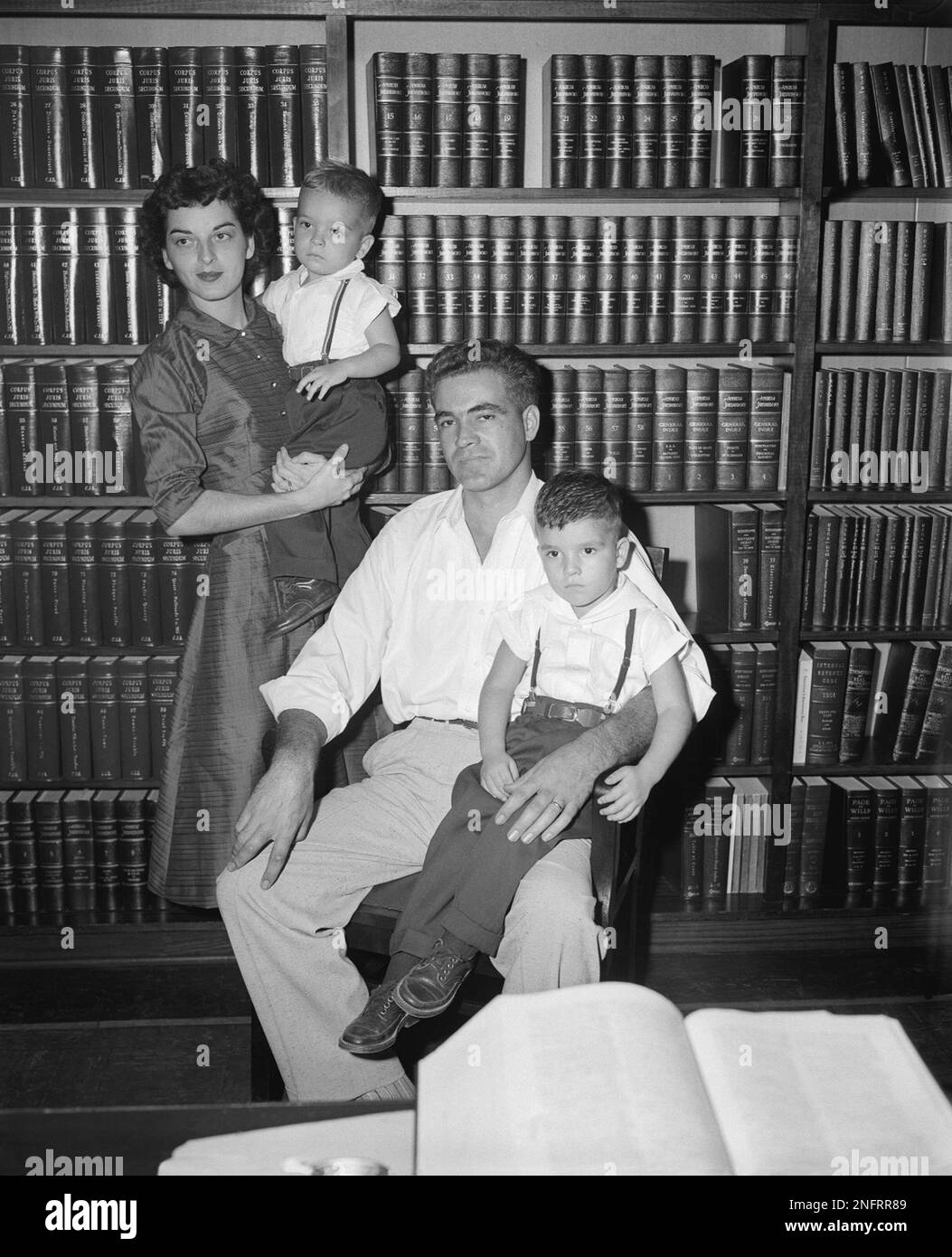 Roy Bryant is shown with his family in the office of his attorney, Sept ...