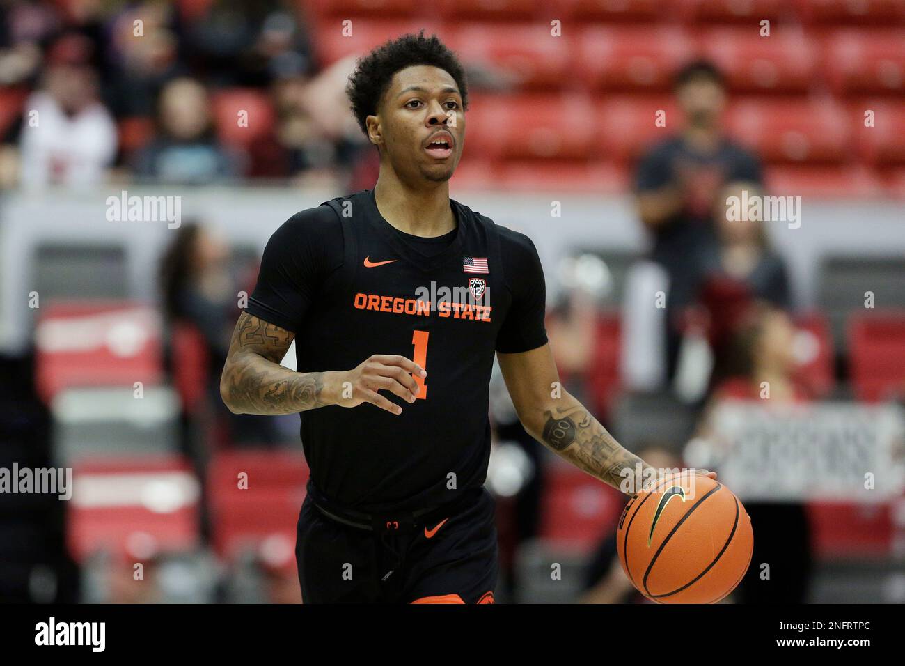 Oregon State guard Christian Wright controls the ball during the first half of an NCAA college ...