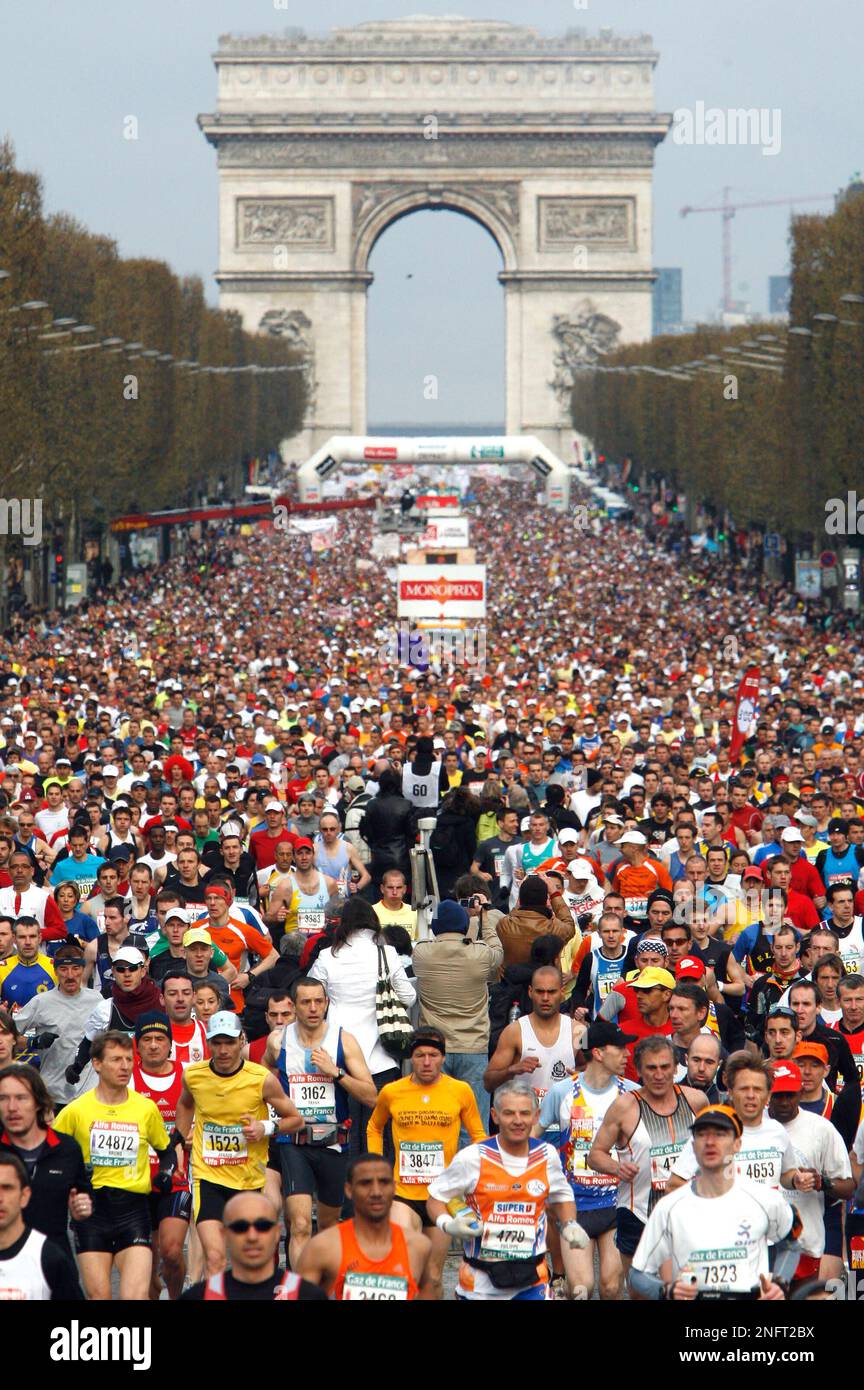 Runners are seen taking part in the 32nd Paris Marathon on the Champs ...