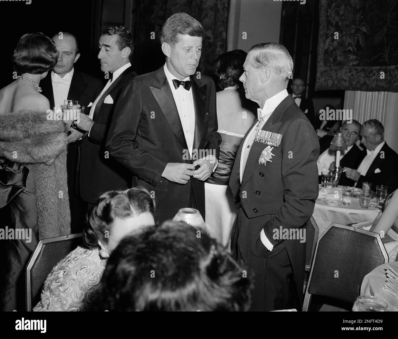 Sen. John F.Kennedy (D-Mass), left , and the Duke of Windsor engage in ...
