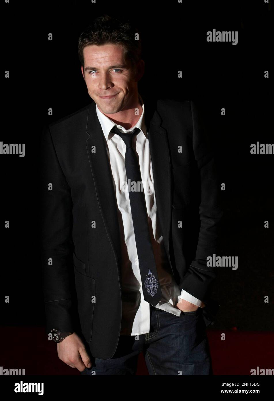 British actor Sean Maguire poses for photographers as he arrives for ...