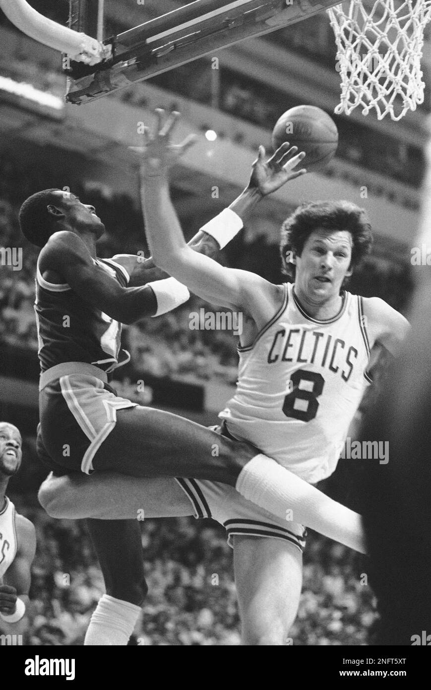 Boston Celtics Scott Wedman, right, and Los Angeles Lakers Michael ...