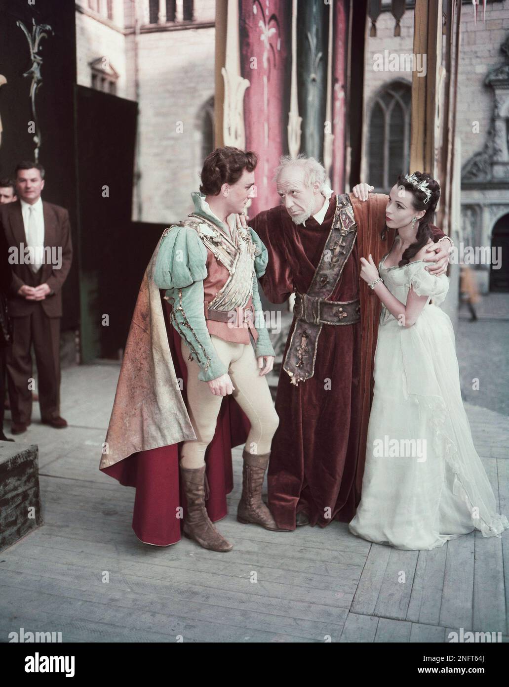 Polonius played by Michael Hordern, center, talks with his son Laertes ...